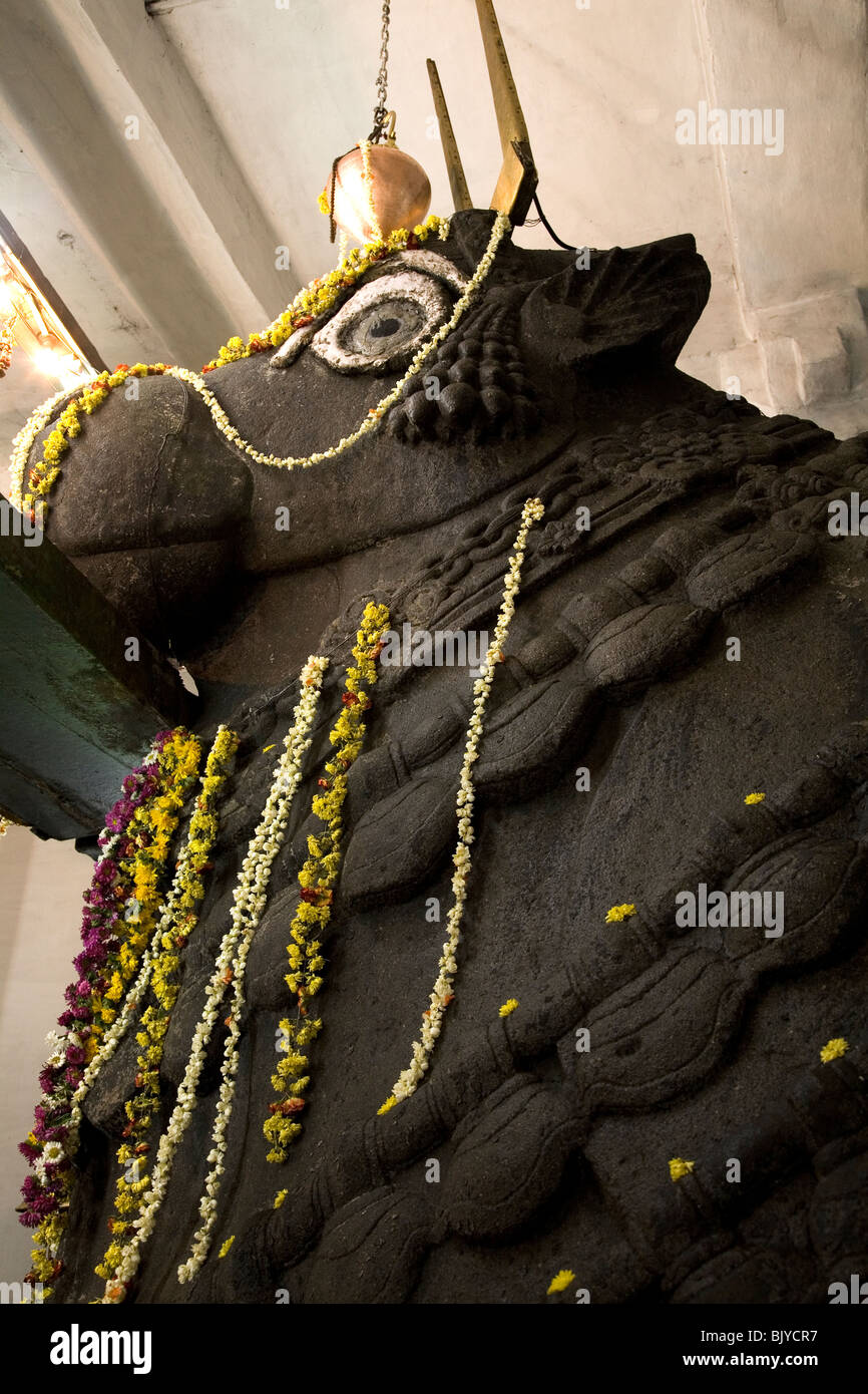Garlanded granite sixteenth century Nandi statue in the Basavanagudi ...