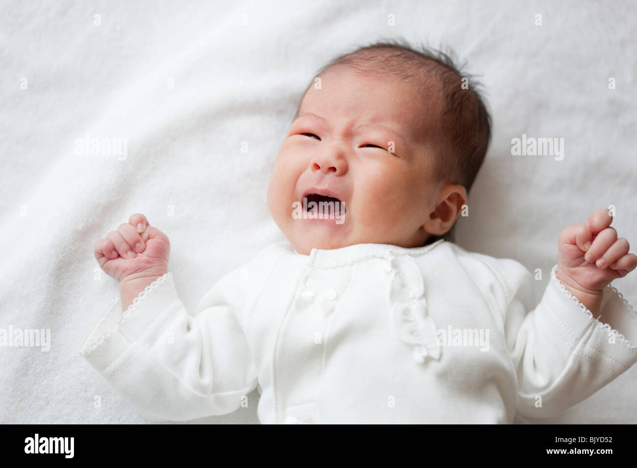 Newborn baby crying Stock Photo - Alamy