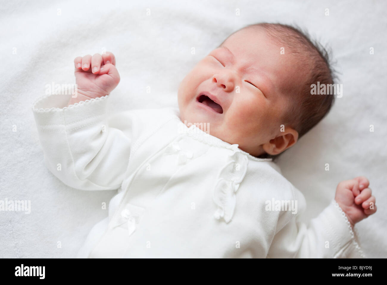 Newborn baby crying Stock Photo - Alamy