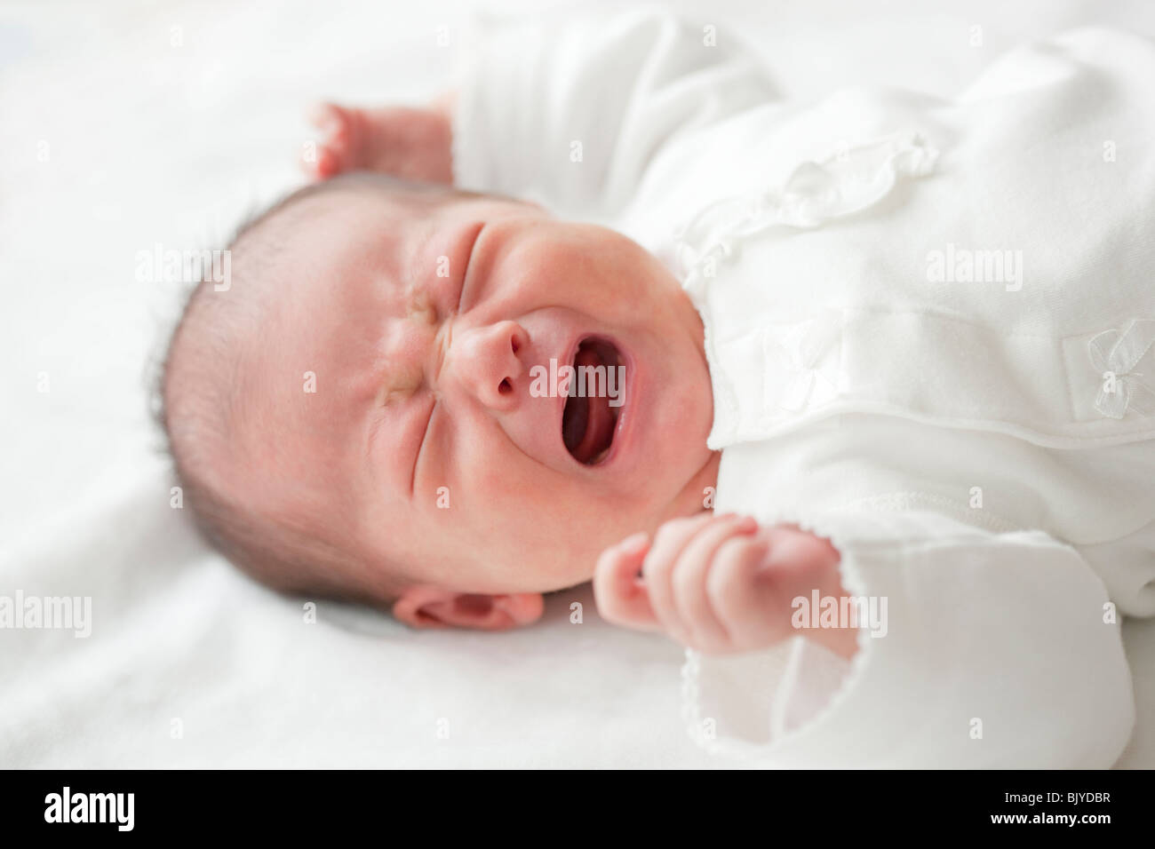 Newborn baby crying Stock Photo - Alamy