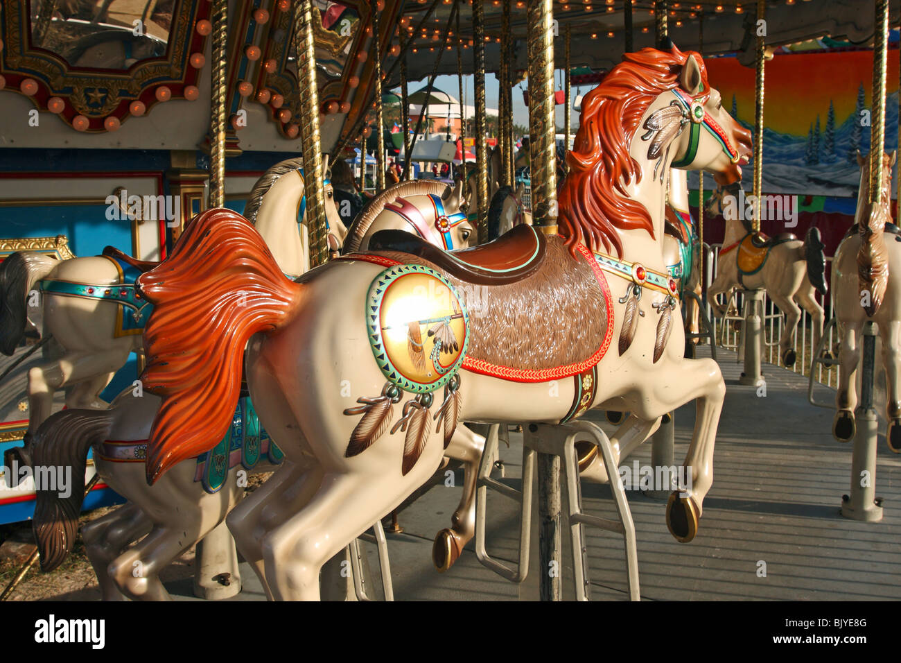 a horse on a carousel ride at a county fair Stock Photo - Alamy