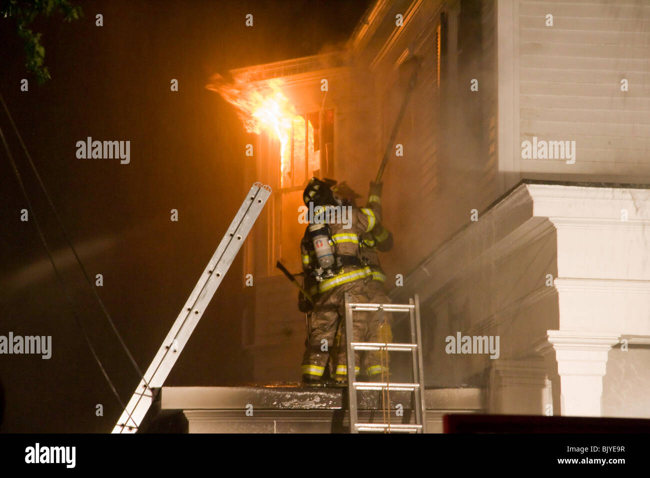 Fireman america burning building hi-res stock photography and images ...