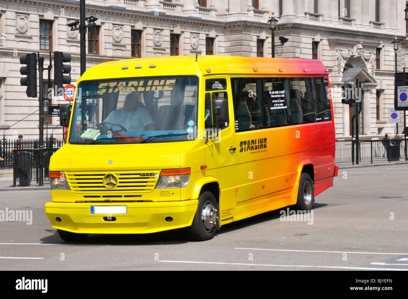 Mini coach bus and driver Stock Photo - Alamy