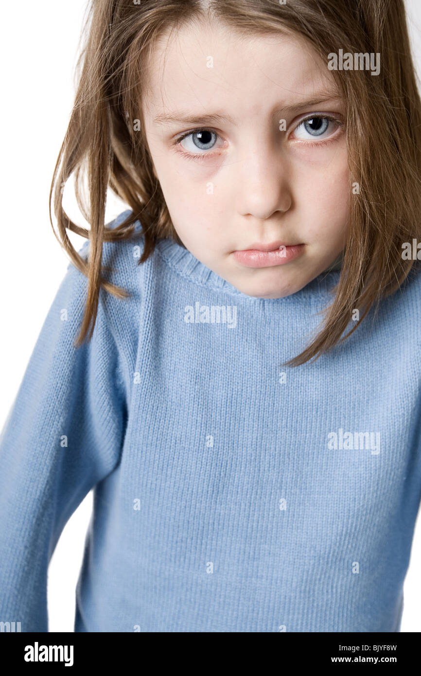 Shot of a Cute Child Sulking against White Stock Photo - Alamy
