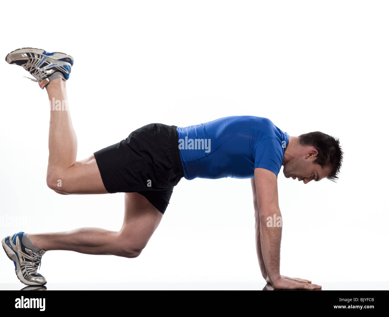 man doing workout on white isolated background Stock Photo - Alamy