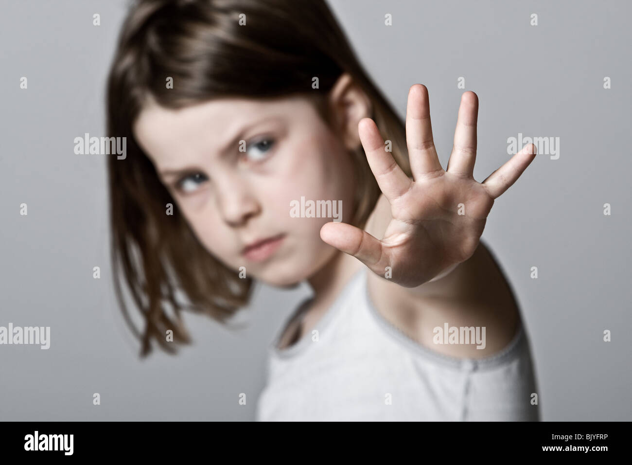 Powerful Shot of a Child with her Hand Up Stock Photo - Alamy