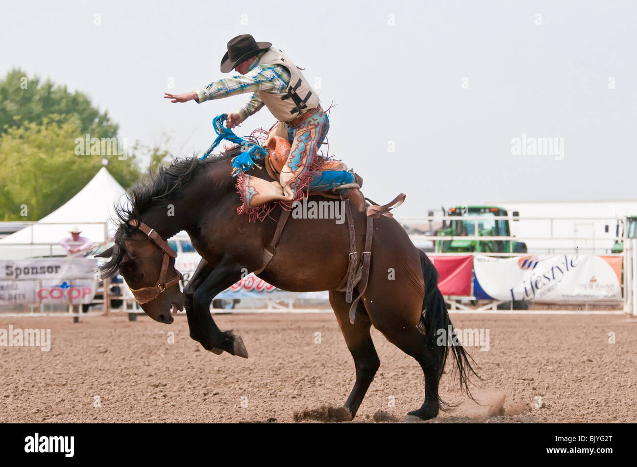 Cowboy, saddle bronc riding, Strathmore Heritage Days, Rodeo ...