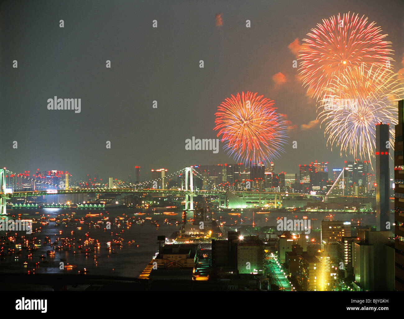 Firework display over city at night, Tokyo, Japan Stock Photo - Alamy