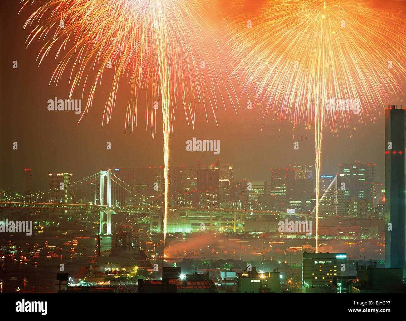 Firework display over city at night, Tokyo, Japan Stock Photo - Alamy
