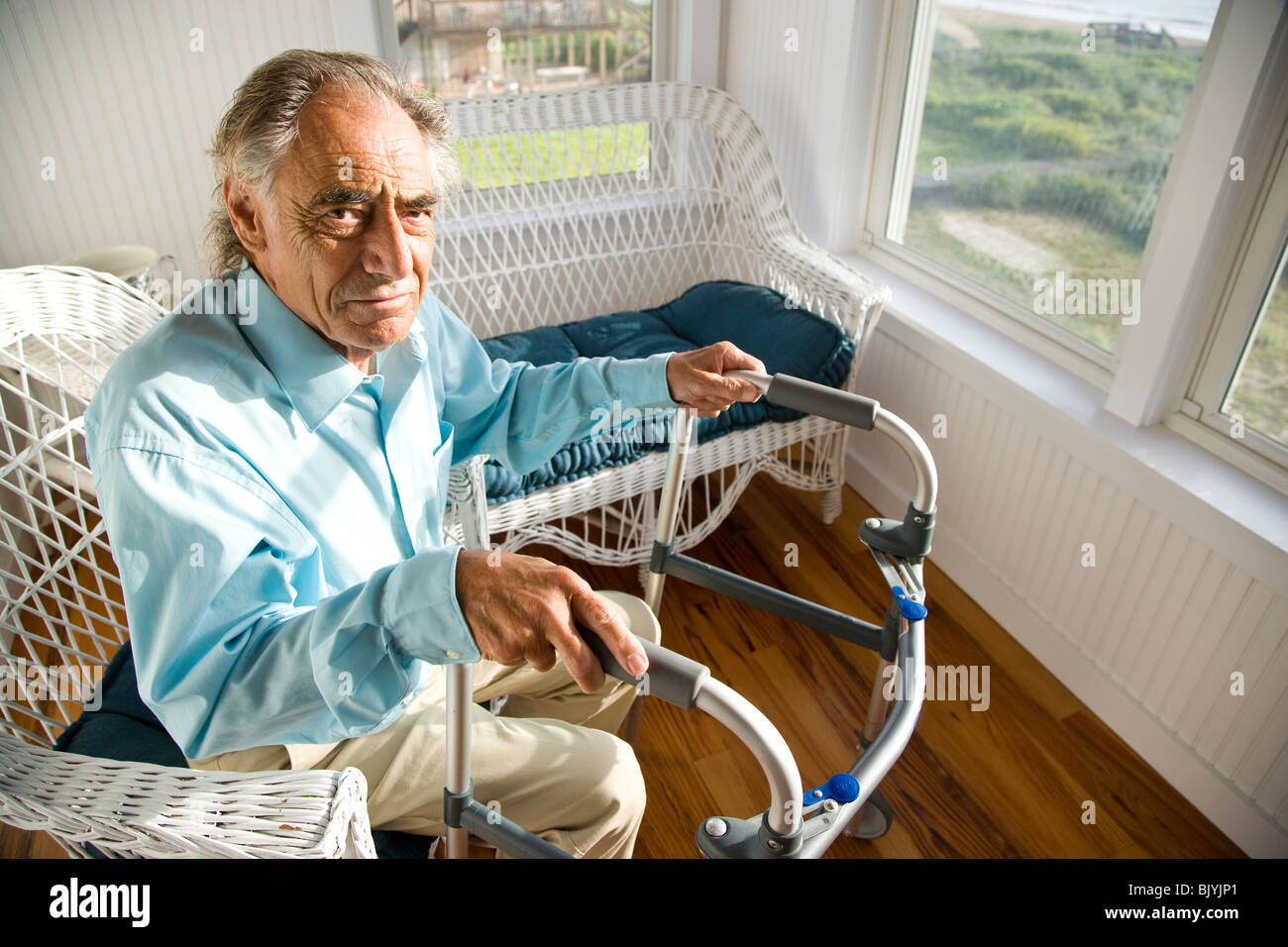 Old man with walker hi-res stock photography and images - Alamy