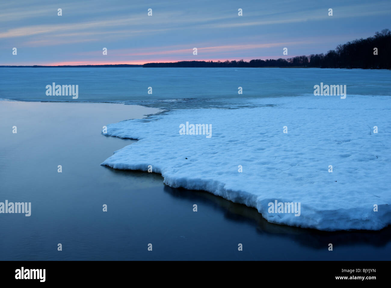 Arrival of spring - ice is melting from the lake Stock Photo - Alamy
