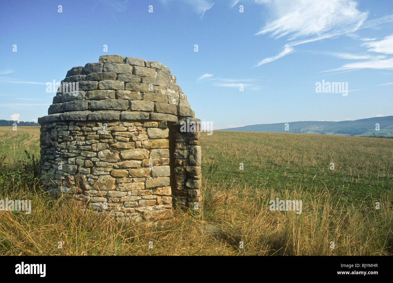 Remains of a round dry limestone hut near Bubnell, Derbyshire, England ...