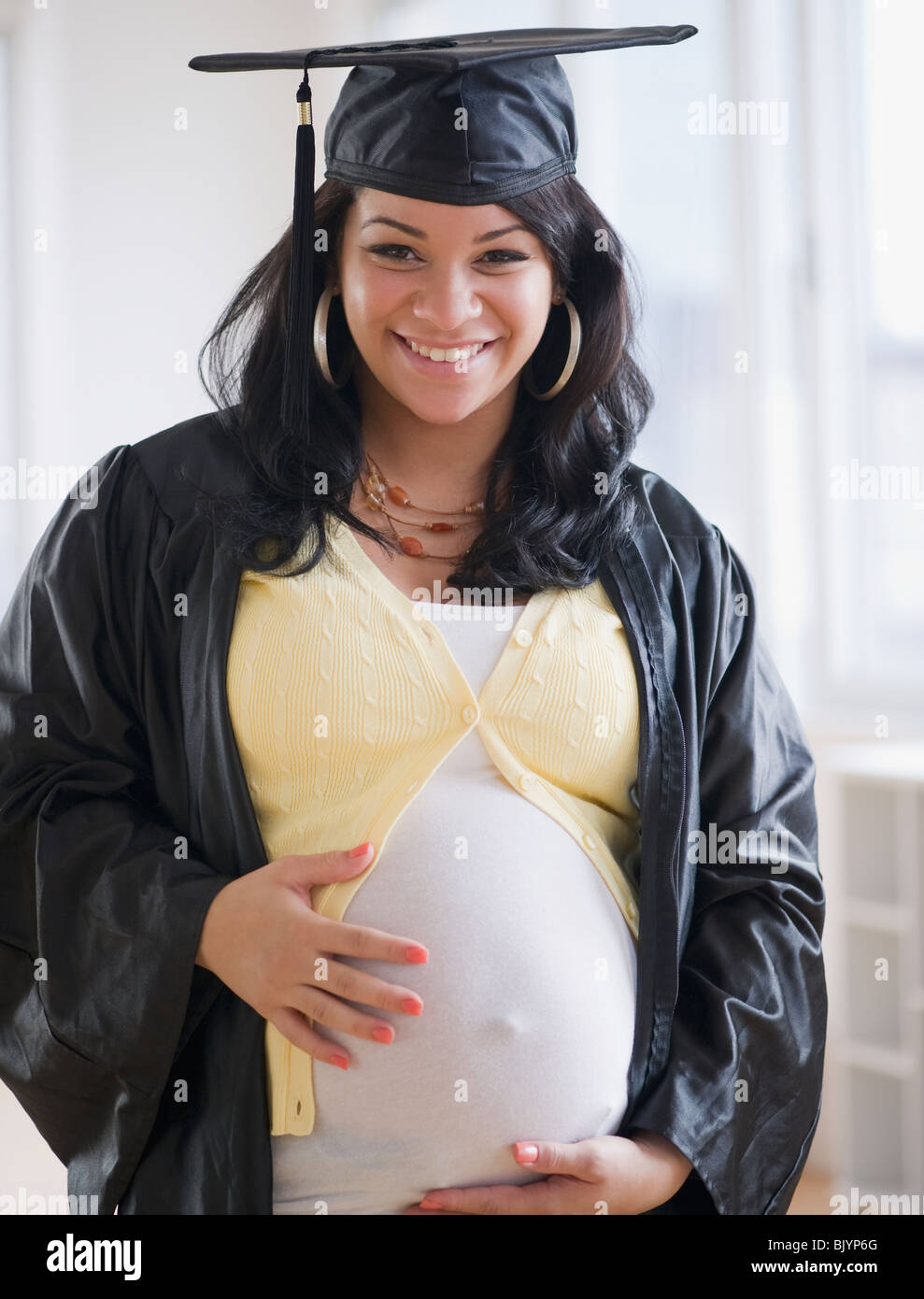 Woman in graduation cap standing hi-res stock photography and images ...