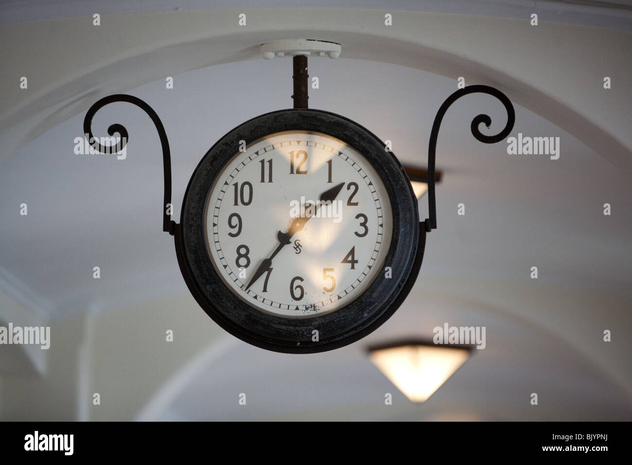 Hanging clock in hallway corridor hi-res stock photography and images ...