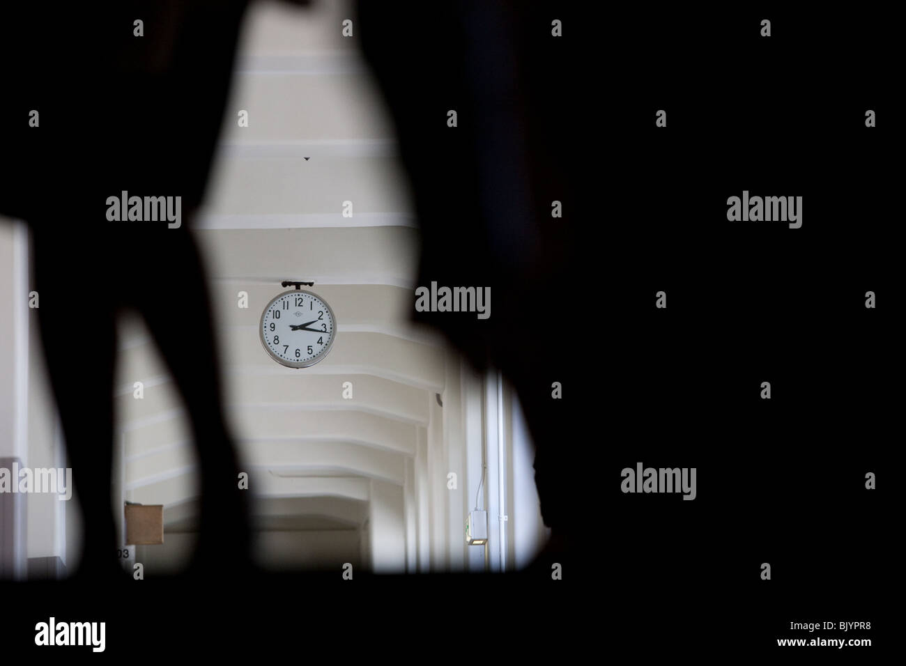Hanging clock in hallway corridor hi-res stock photography and images ...