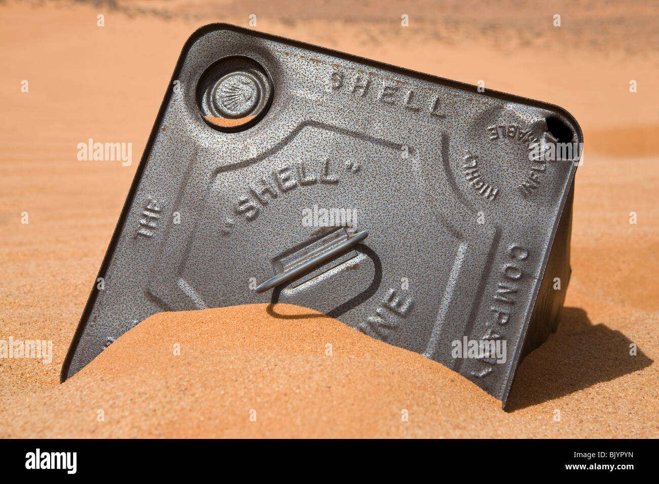 Rusting metal fuel cans with Shell Logo left over from WW2 period ...