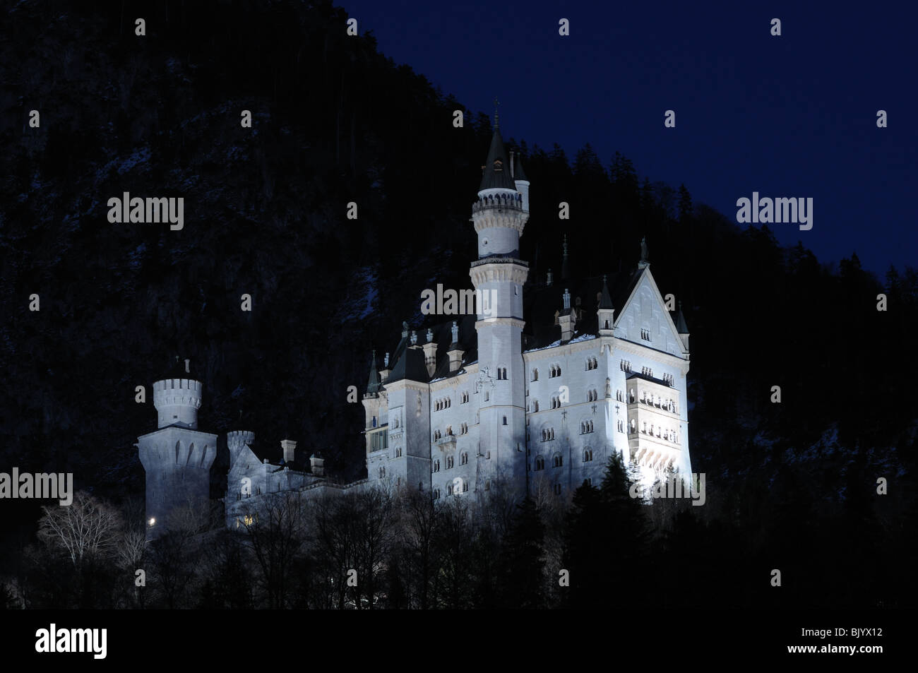 Amazing Neuschwanstein Castle illuminated at night. Bavaria, Germany ...