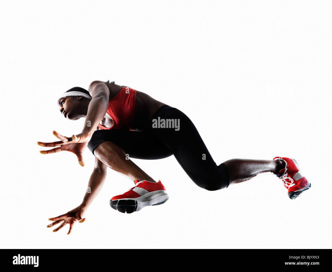 Female athlete preparing run Cut Out Stock Images & Pictures - Alamy