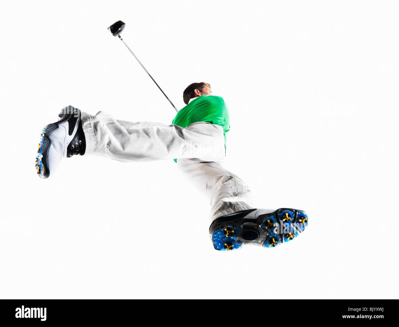 Man playing golf shot Stock Photo - Alamy