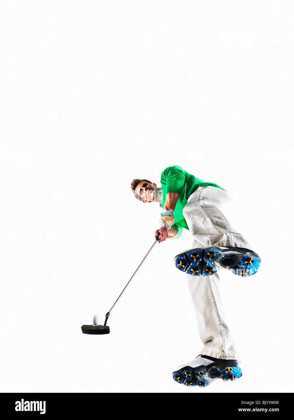 Man playing golf shot Stock Photo - Alamy