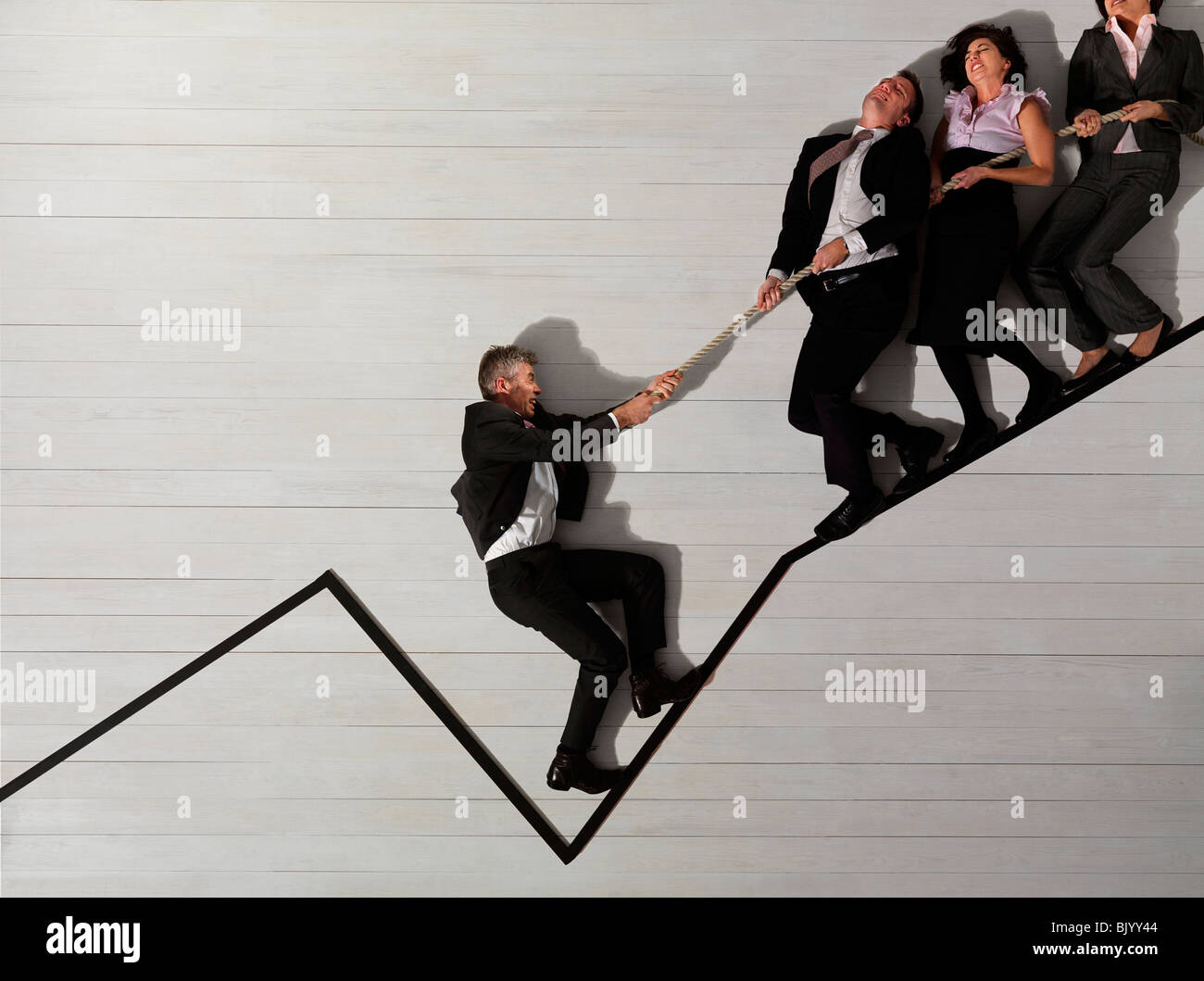 Business people pulling other hi-res stock photography and images - Alamy