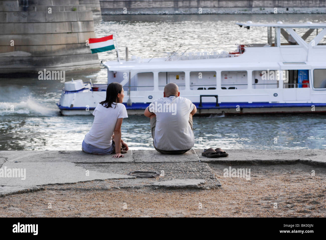People sitting on Danube bank Budapest Hungary Europe Stock Photo - Alamy