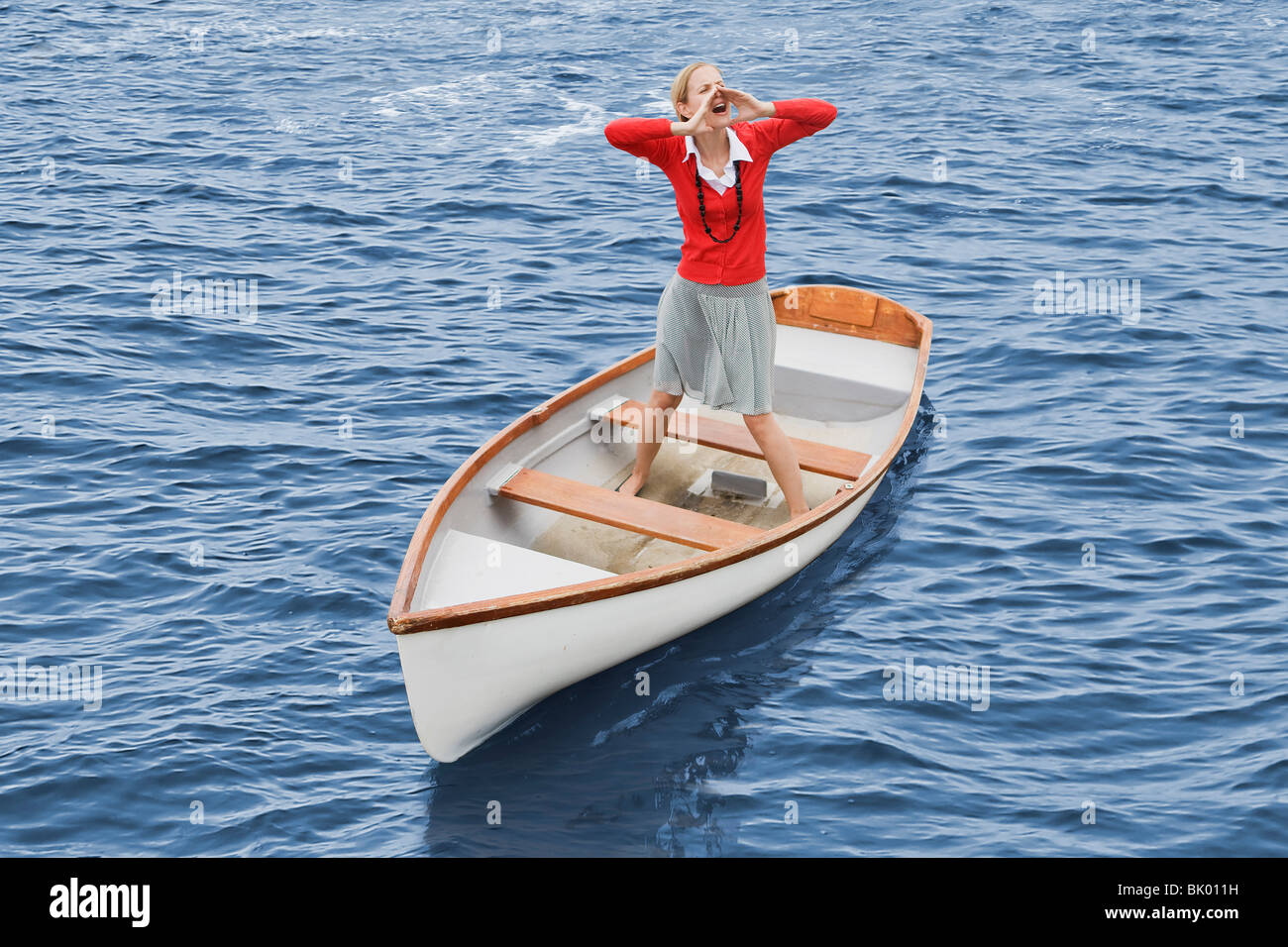 Woman crying for help Stock Photo - Alamy