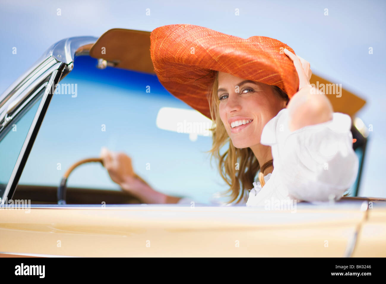 Pretty woman in convertible Stock Photo - Alamy