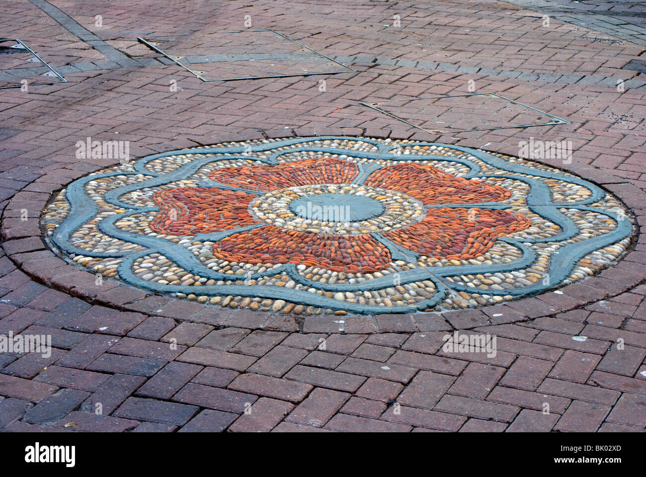 Decorative rose in the paving of Rose Street in the centre of Edinburgh ...