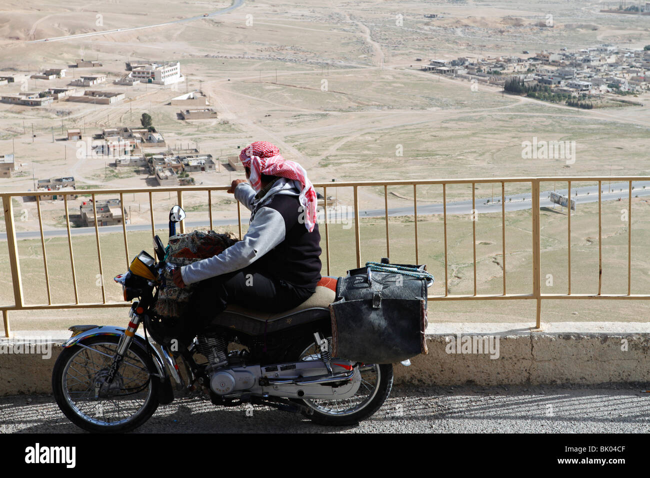 A bedouin on a motorcycle near Palmyra in Syria Stock Photo - Alamy