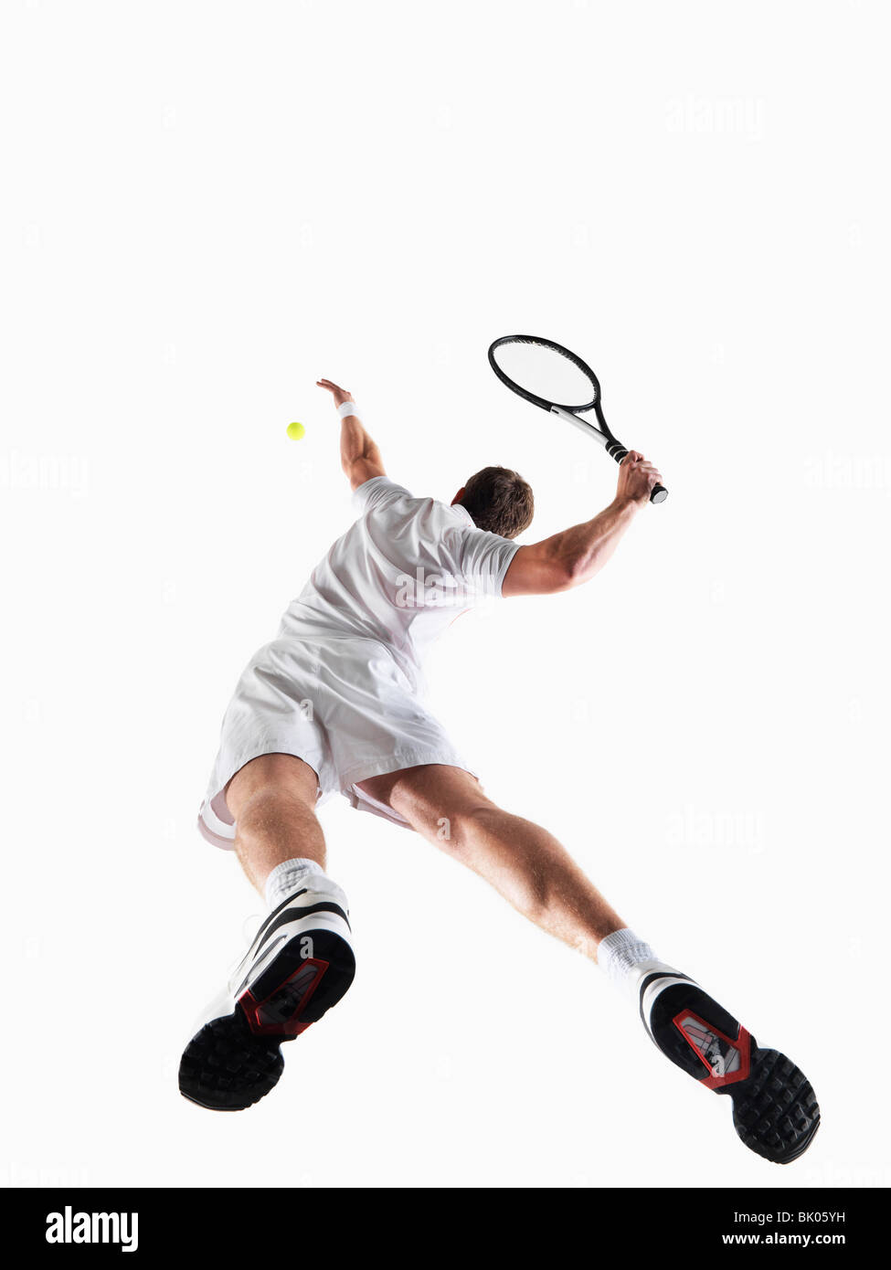 Man playing tennis Stock Photo - Alamy