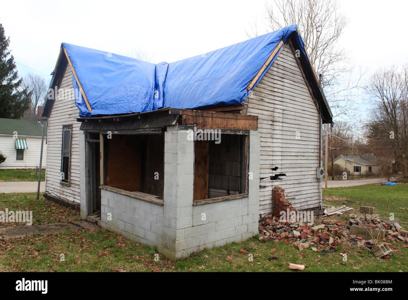 Run down empty house. fallen bricks, restoration project wooden ...