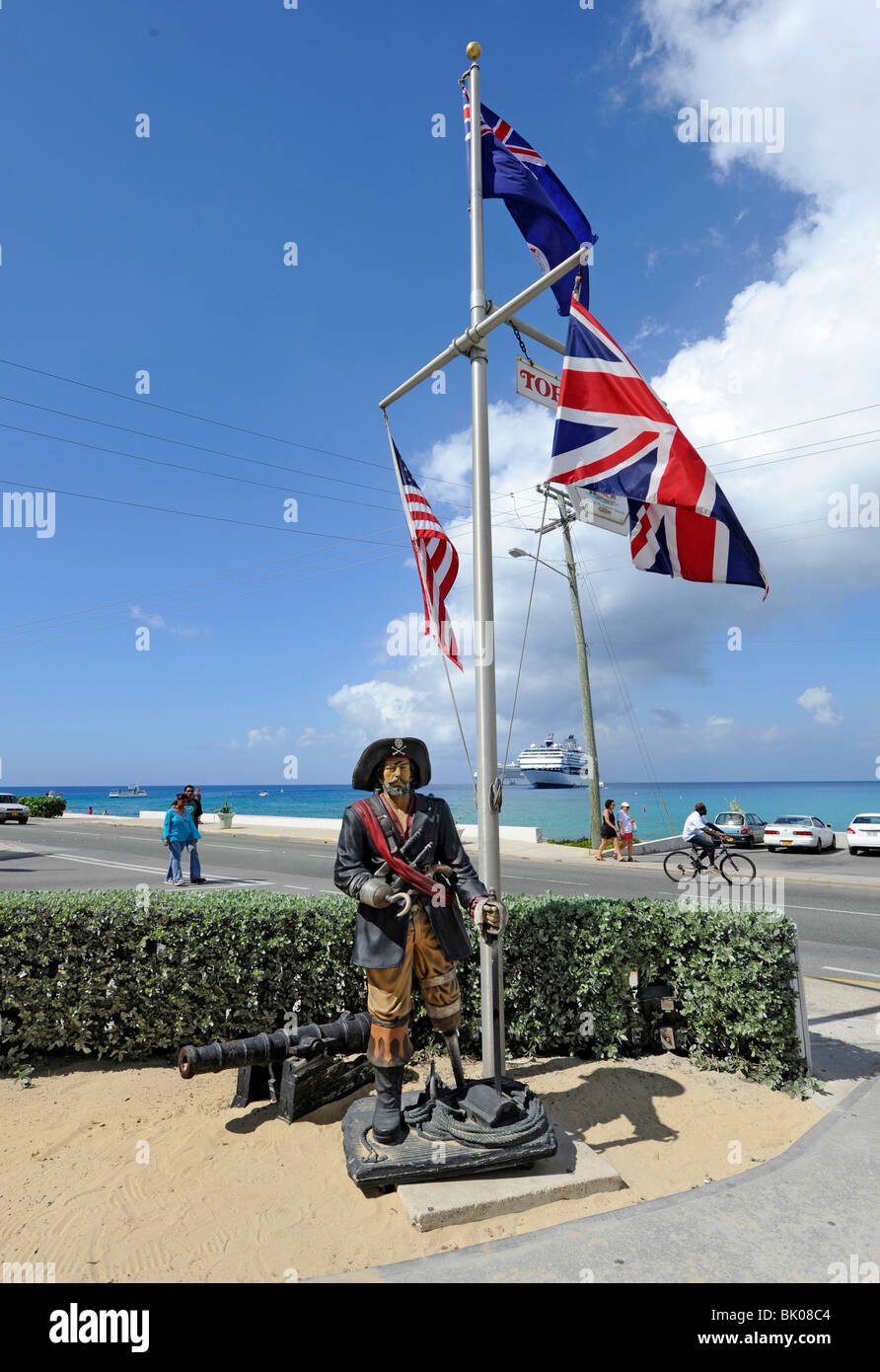 Pirate statue with flags at Tortuga Rum Cake Ship Grand Cayman Islands ...
