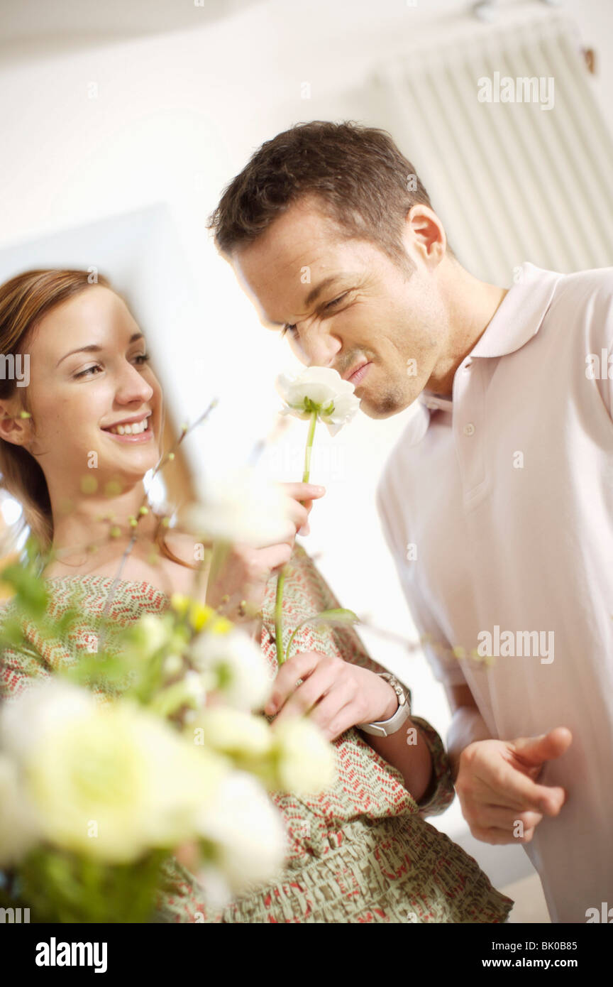 Man sniffing a flower hi-res stock photography and images - Alamy