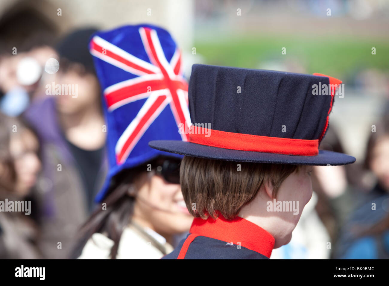 Moira Cameron. first female Beefeater, posing with tourist wearing ...