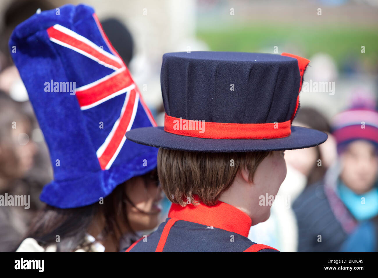 Moira Cameron. first female Beefeater, posing with tourist wearing ...