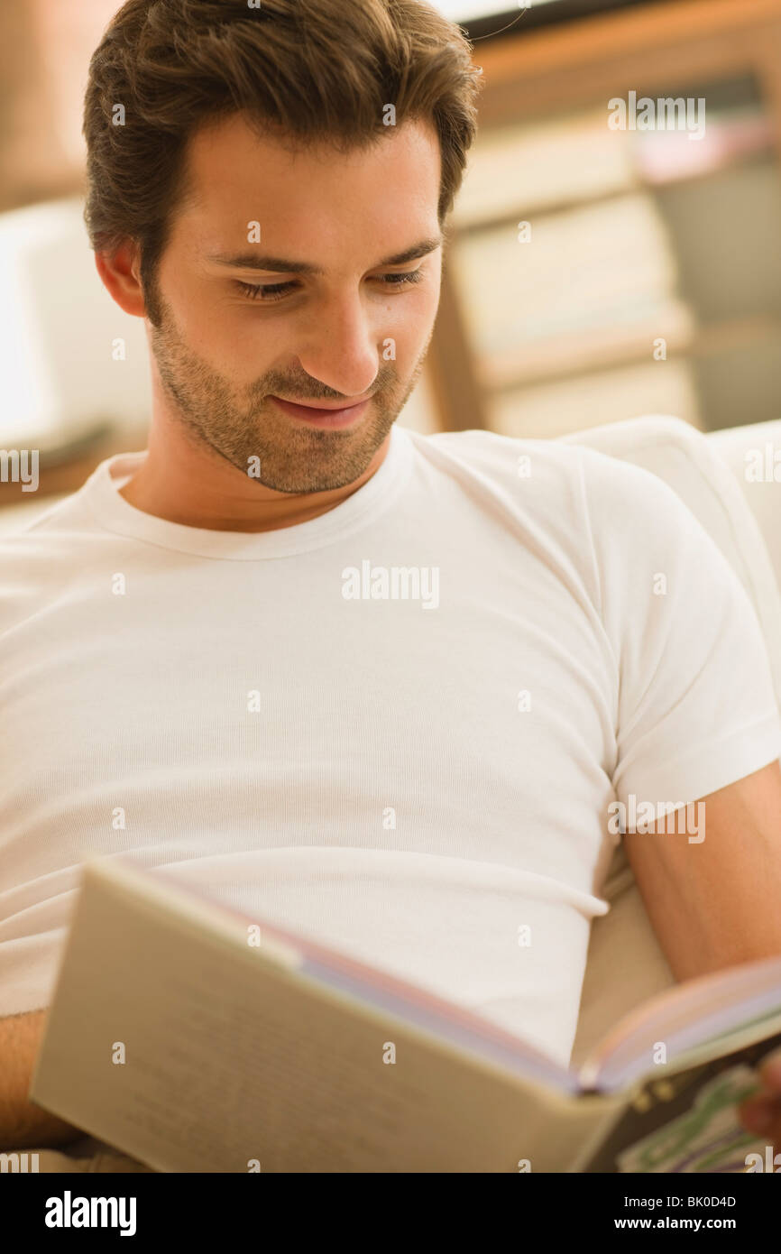 Man reading a book Stock Photo - Alamy