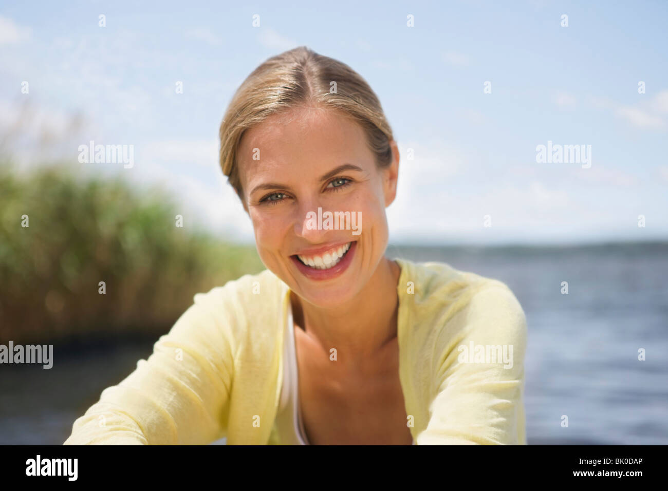 Outdoor portrait of a smiling woman Stock Photo - Alamy