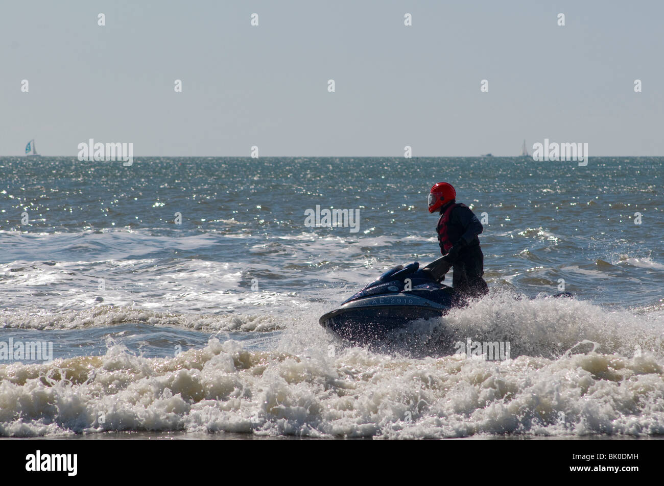 Jet skiing off the beach in Bournemouth, jumping the surf and having ...