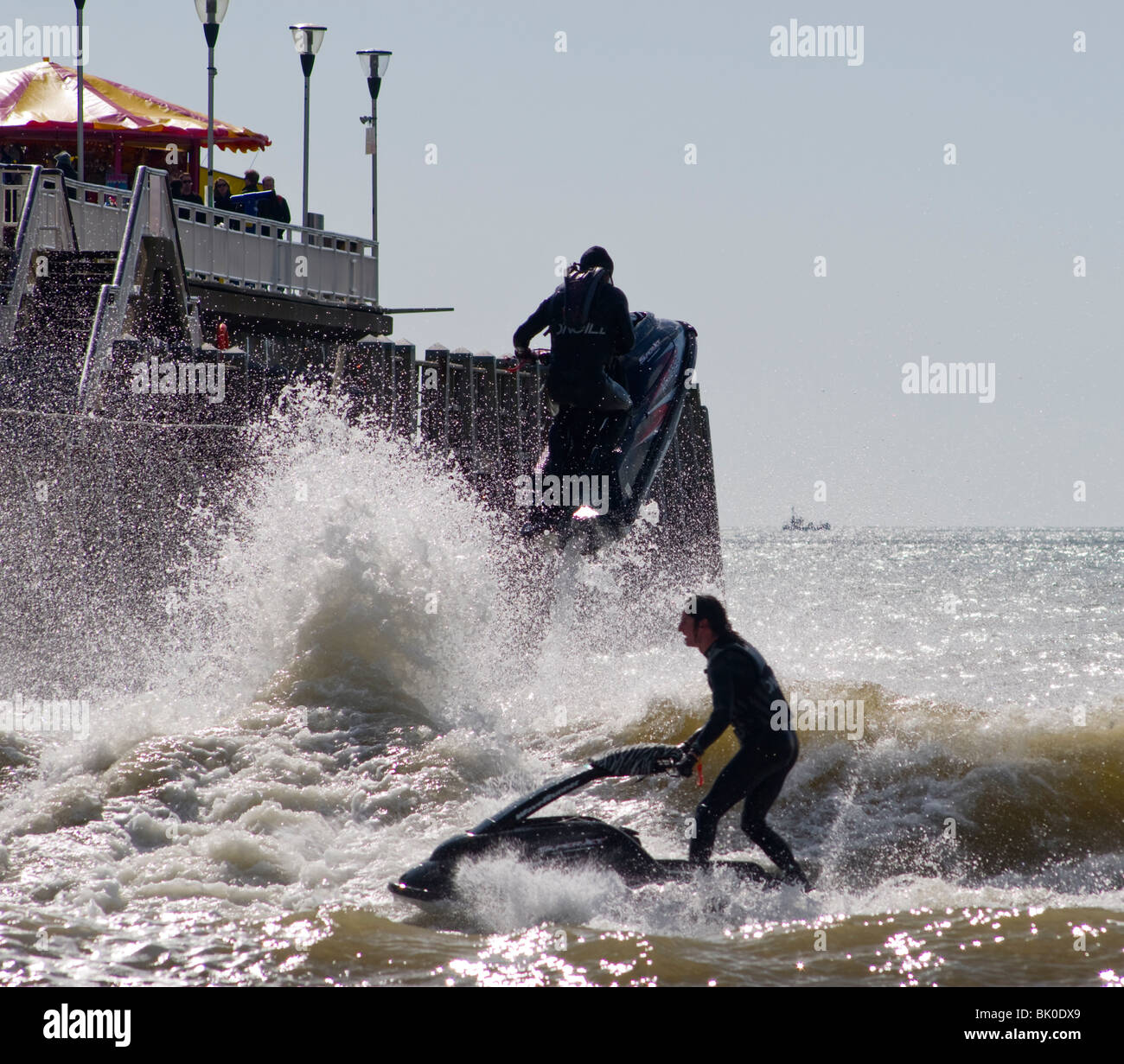 Jet skiing off the beach in Bournemouth, jumping the surf and having ...
