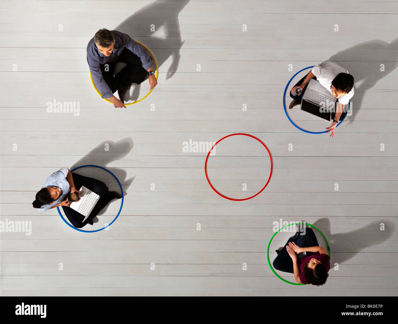 Business men and women in circles Stock Photo - Alamy