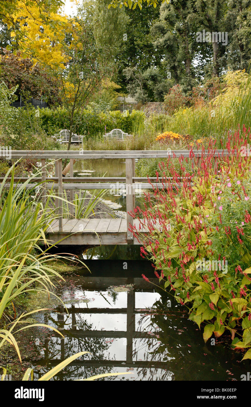 View of a small wooden bridge over lake Patricia, in the Secret Gardens ...