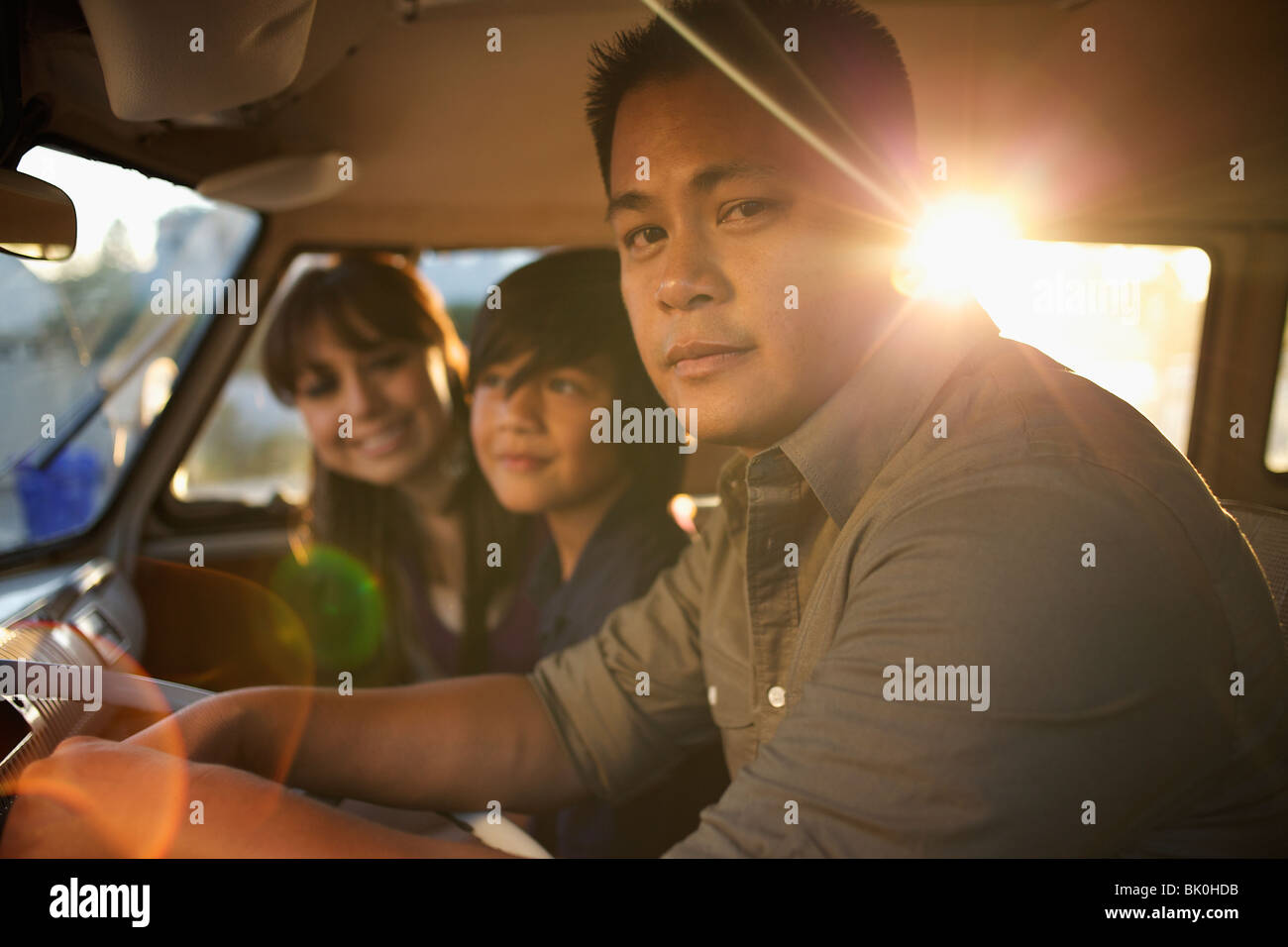 Family riding in van together Stock Photo - Alamy