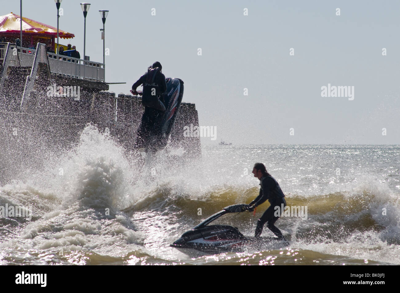 Jet skiing off the beach in Bournemouth, jumping the surf and having ...