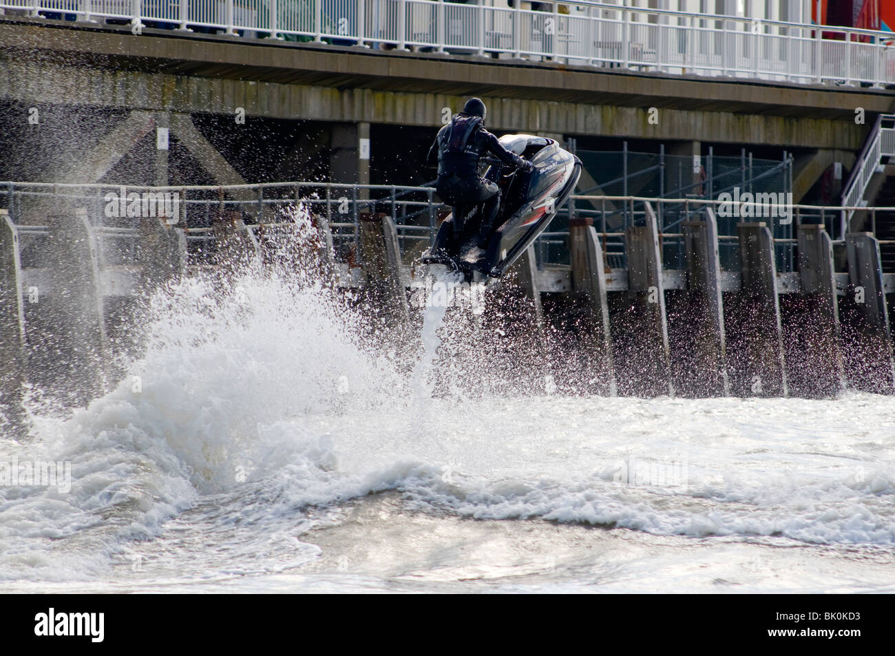 Jet skiing off the beach in Bournemouth, jumping the surf and having ...
