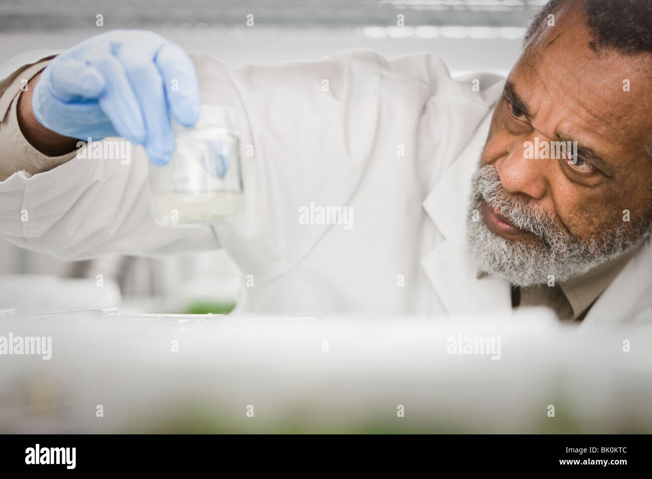 African american scientist in sterile hi-res stock photography and ...