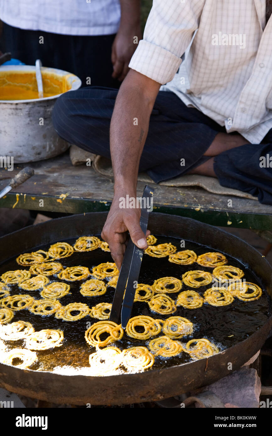 Frying jalebis (indian traditional sweets). Jaipur. Rajasthan. India ...