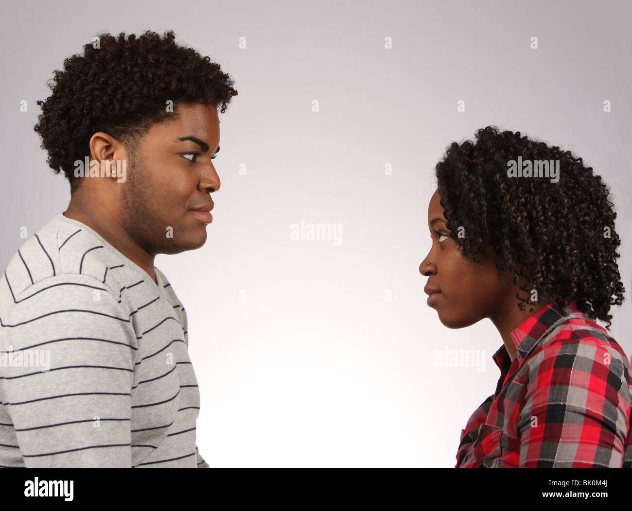 Young African-American couple facing off. © Katharine Andriotis Stock ...