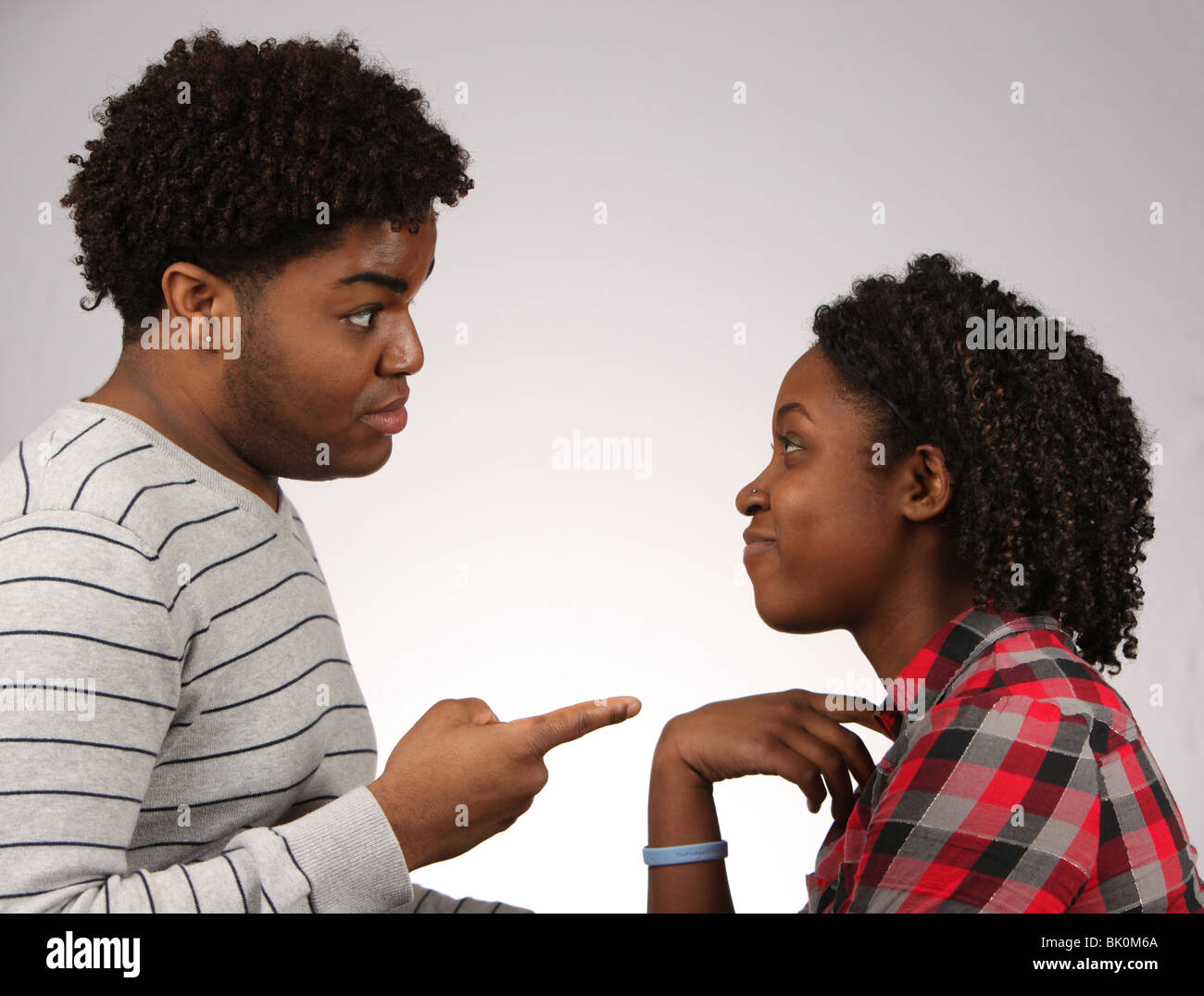 Young African-American couple facing off. © Katharine Andriotis Stock ...