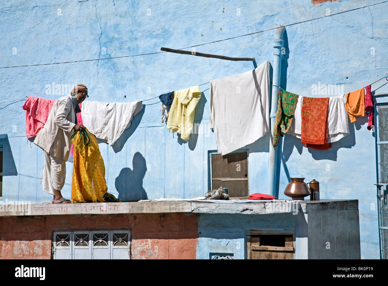 Old man drying clothes. Nagaur. Rajasthan. India Stock Photo - Alamy